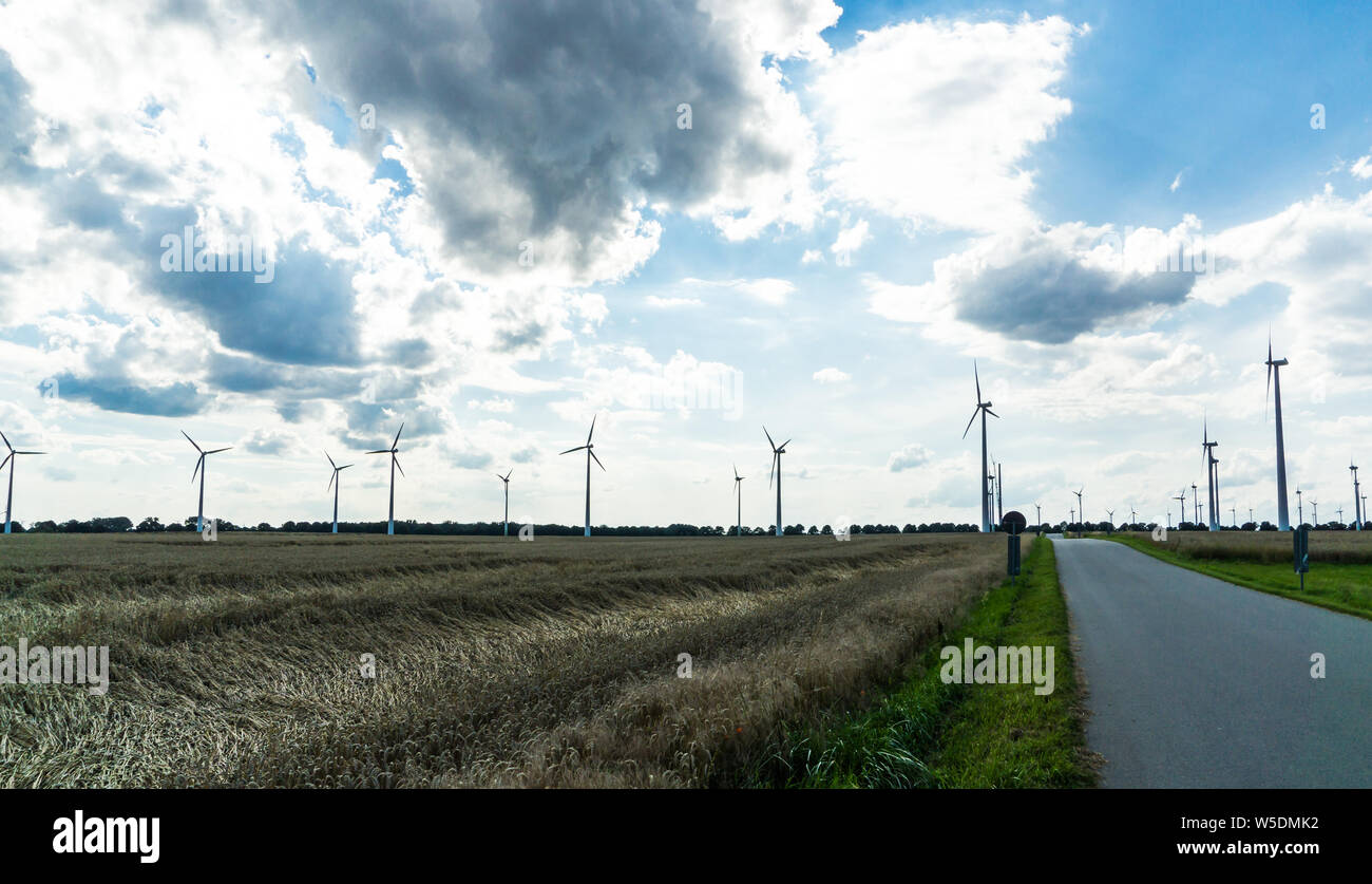 wind mills on a field Stock Photo - Alamy