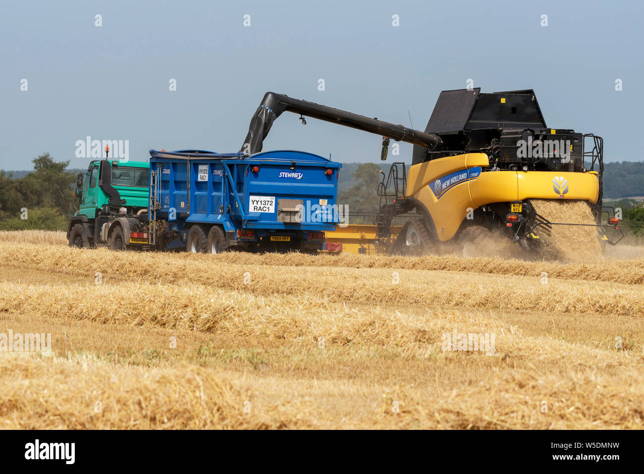 Combine Harvester Offloading Grain High Resolution Stock Photography ...