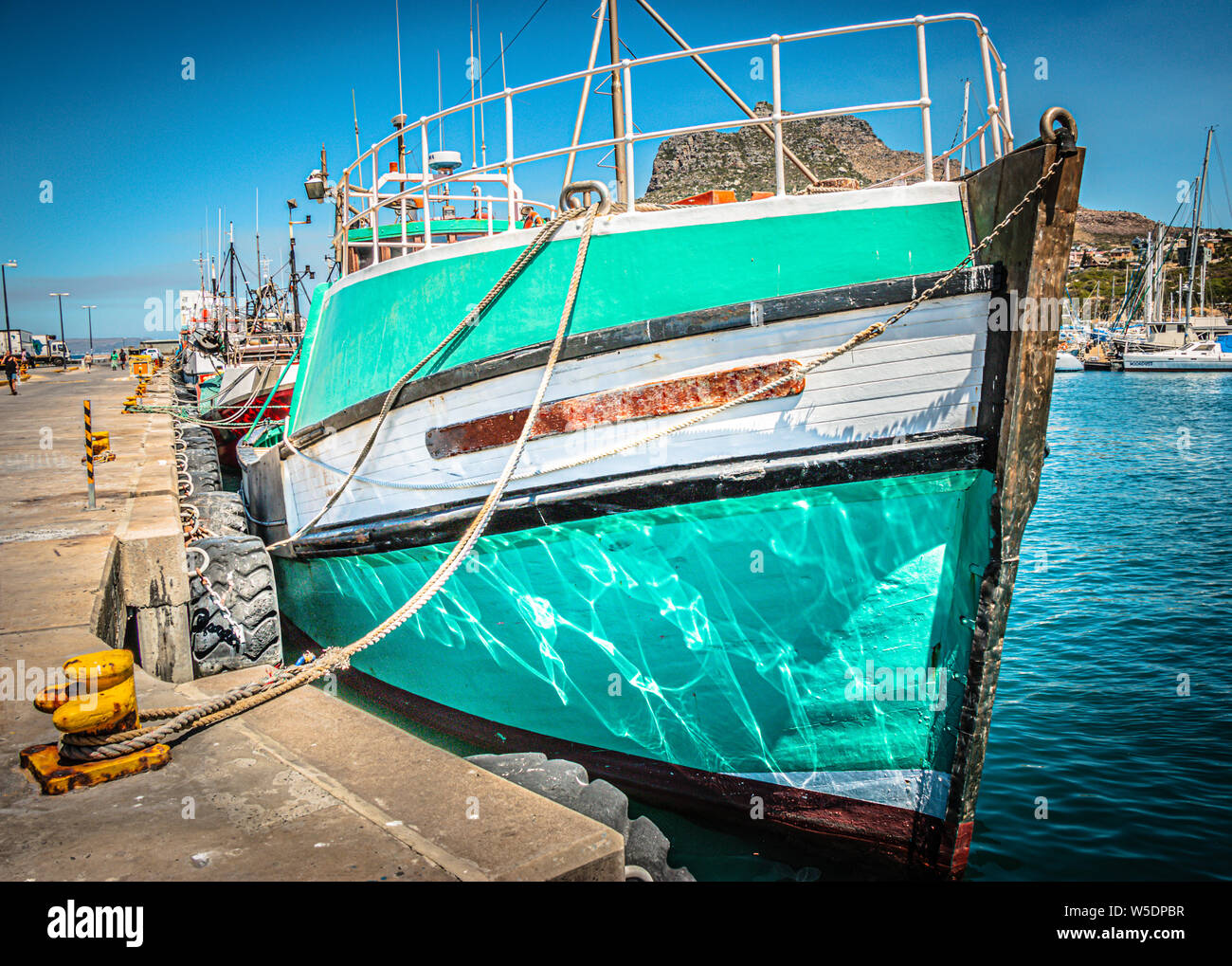 Cape Town, South Africa: Bright boat docked at Hout Bay Mariners Wharf ...