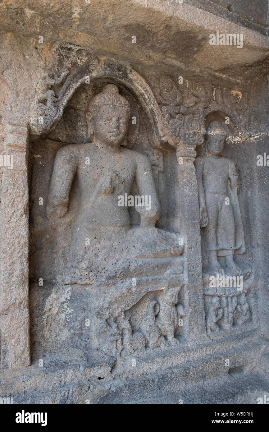 India, Maharashtra, Ajanta, Ajanta Caves. Detail of ornate stone wall ...