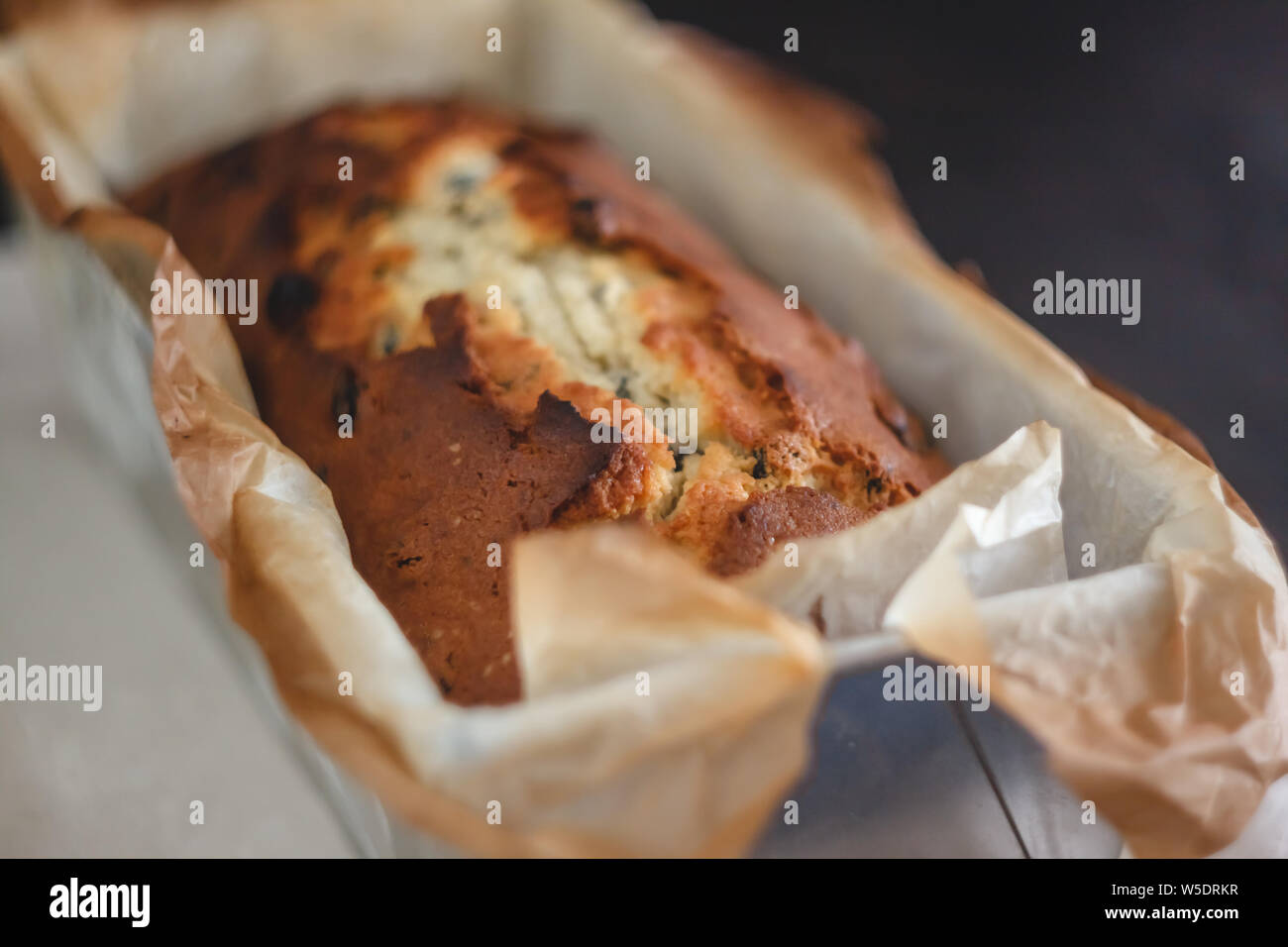 Rectangular ruddy metropolitan cake-bread in a metallic baking dish on ...