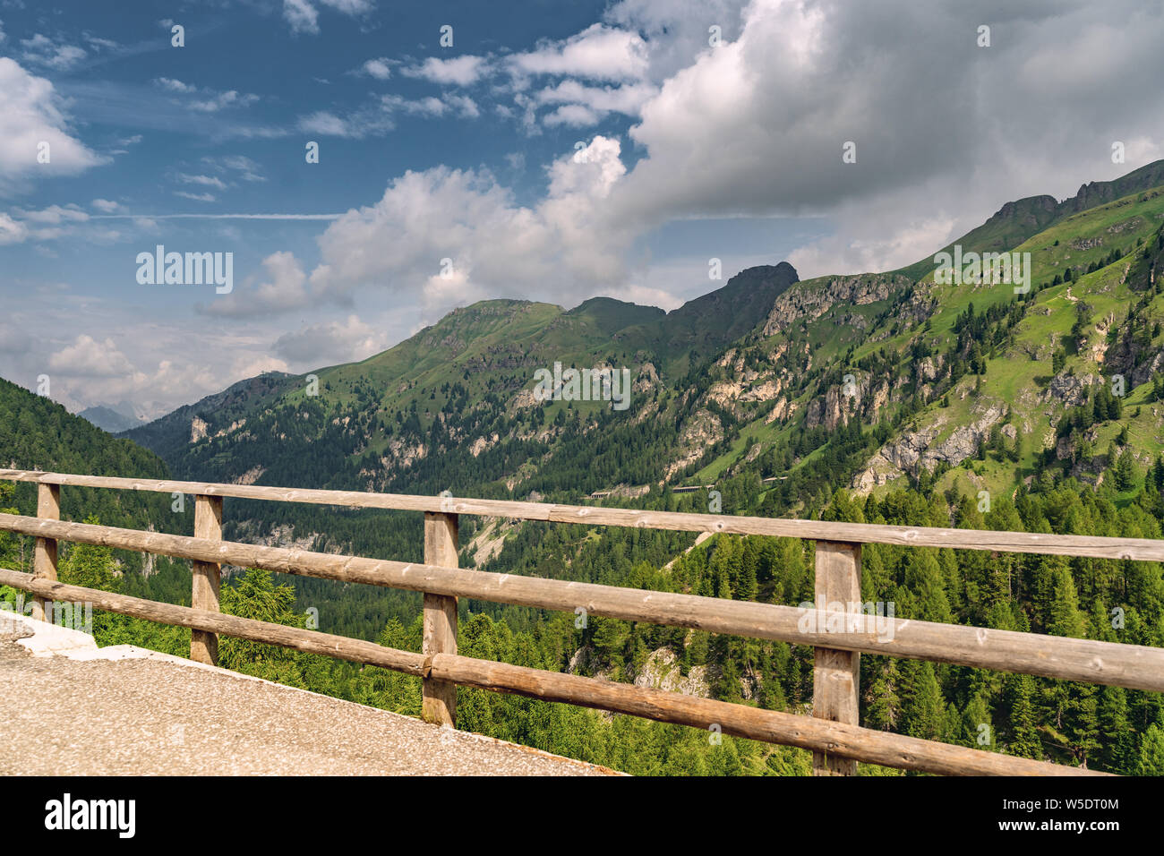 Idyllic Alps with green forest on Alps hill Stock Photo - Alamy