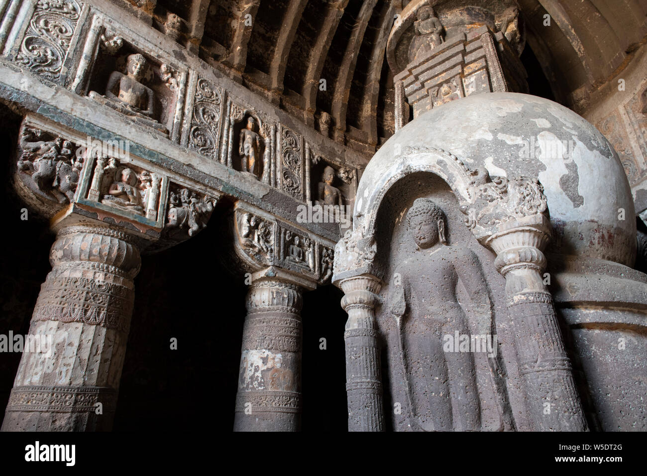 India, Maharashtra, Ajanta, Ajanta Caves. Interior view of ornate ...