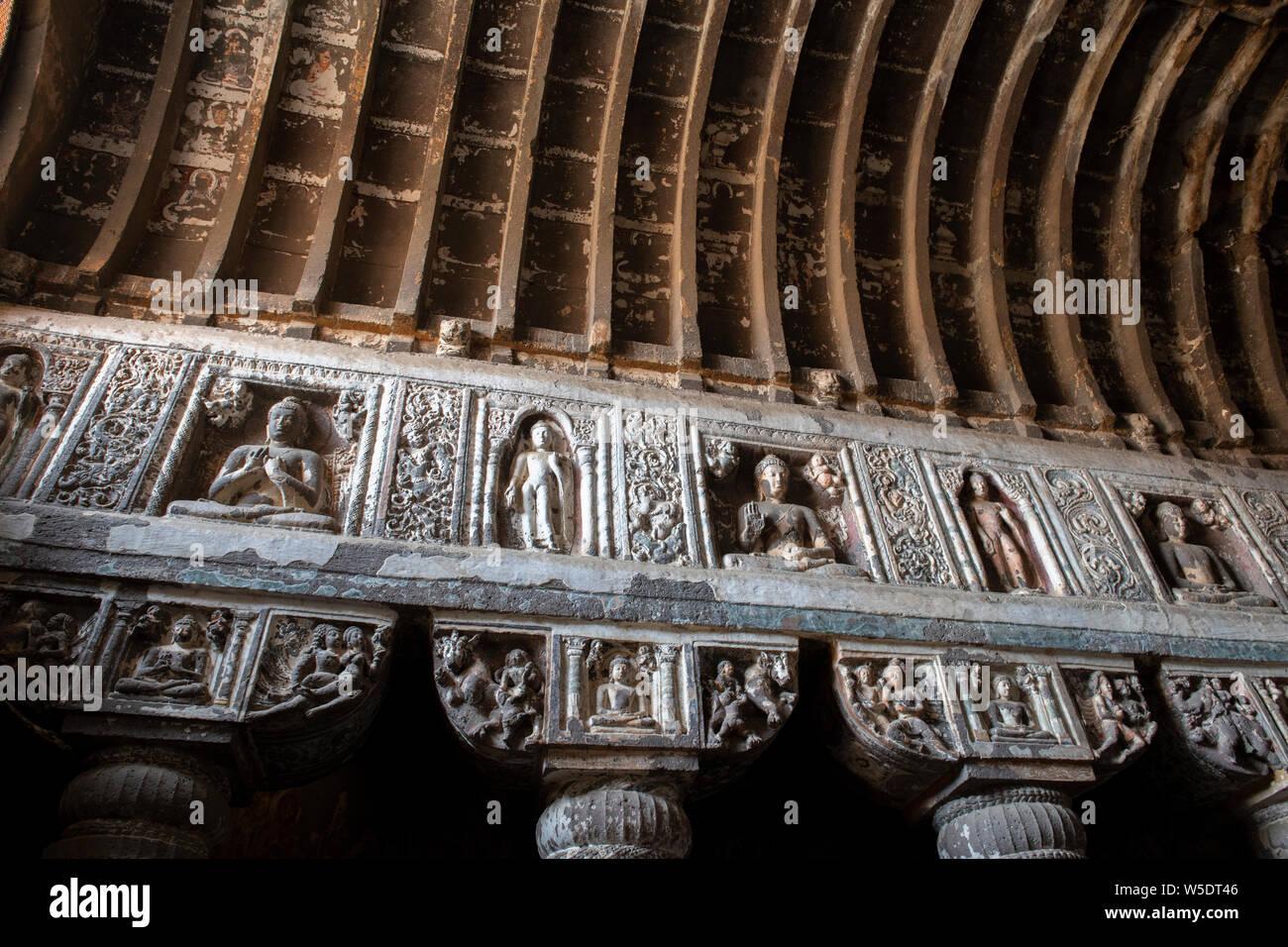 India, Maharashtra, Ajanta, Ajanta Caves. Interior view of ornate ...
