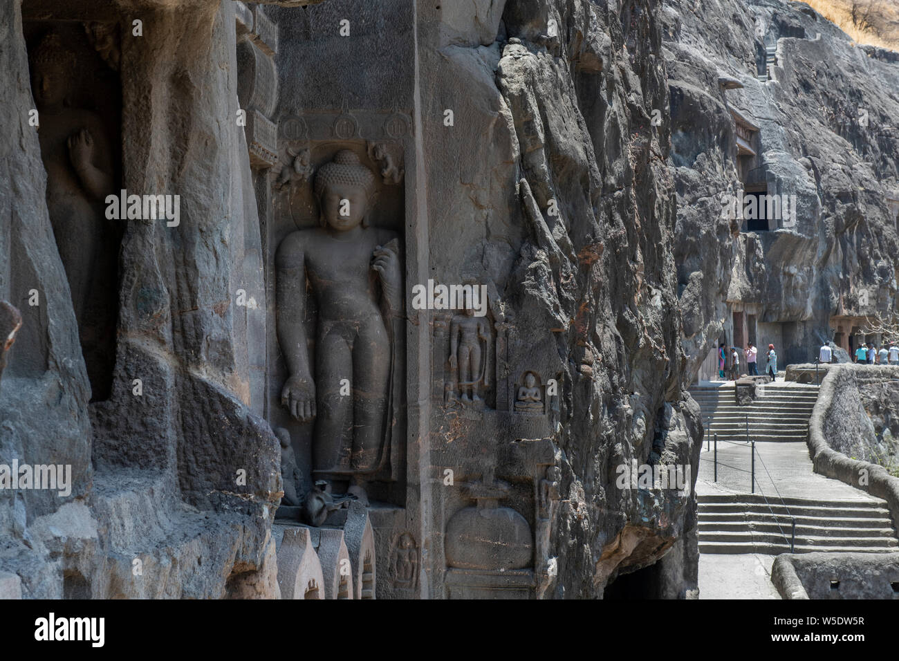India, Maharashtra, Ajanta, Ajanta Caves. Cave exterior with access ...