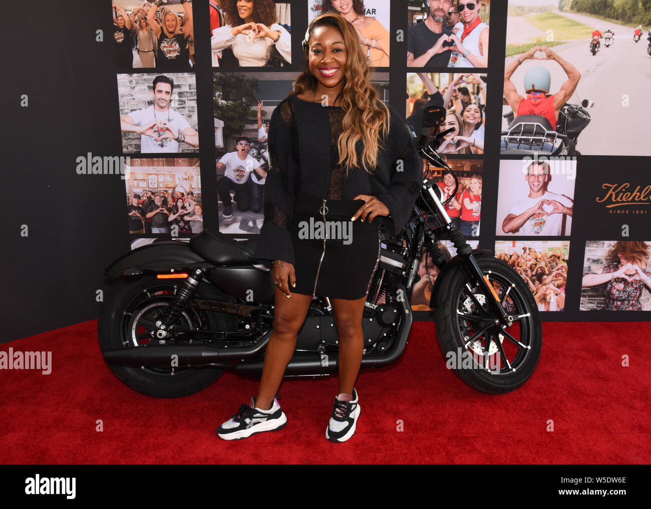 Kinya Claiborne attends the 10th Anniversary Of Kiehl's LifeRide For ...