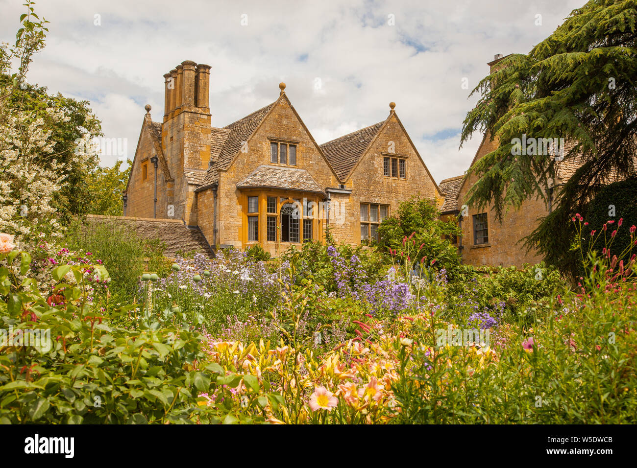 English country house in the grounds of national trust property of ...