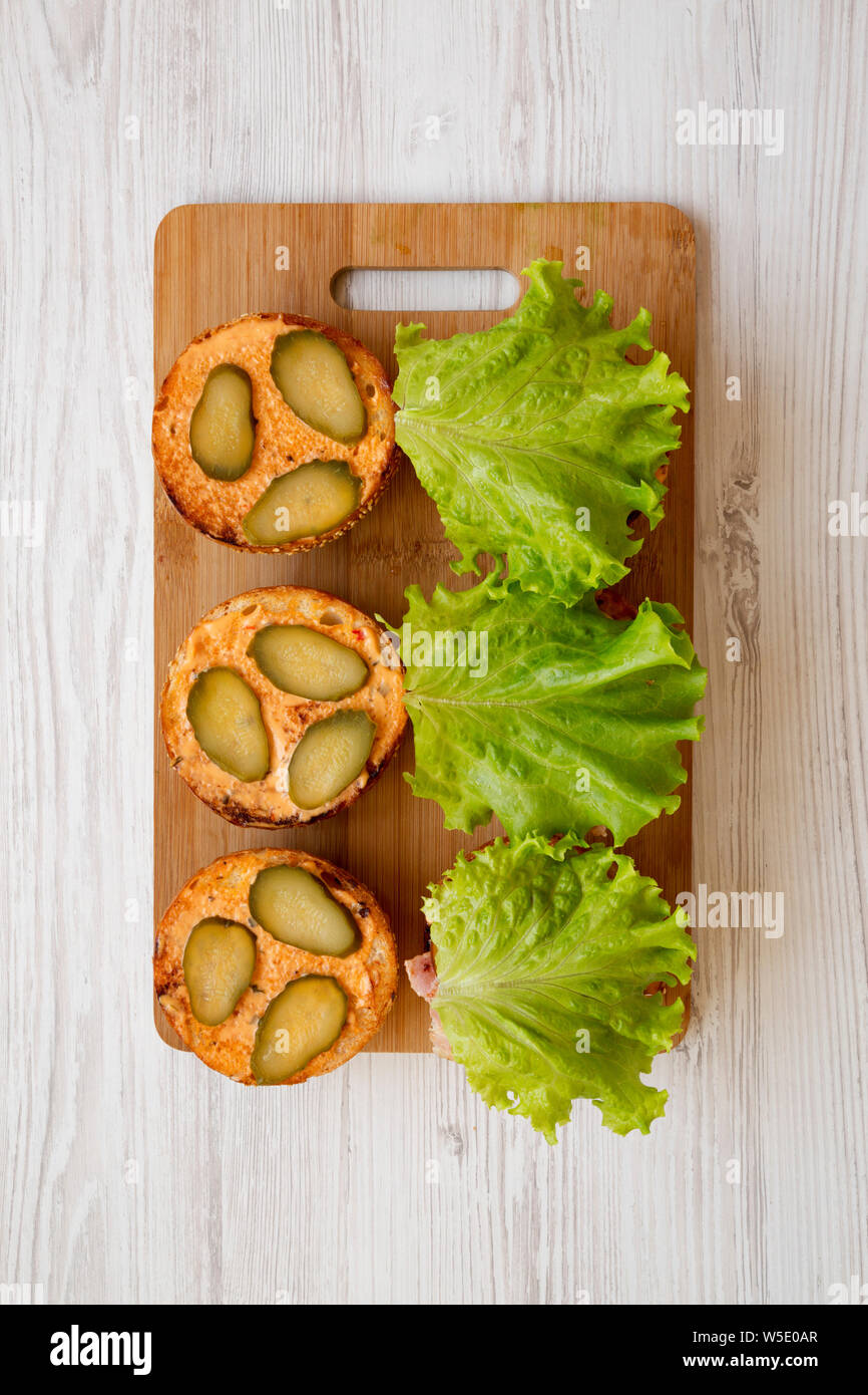 Cooking cheeseburger step-by-step, top view. Flat lay, from above ...