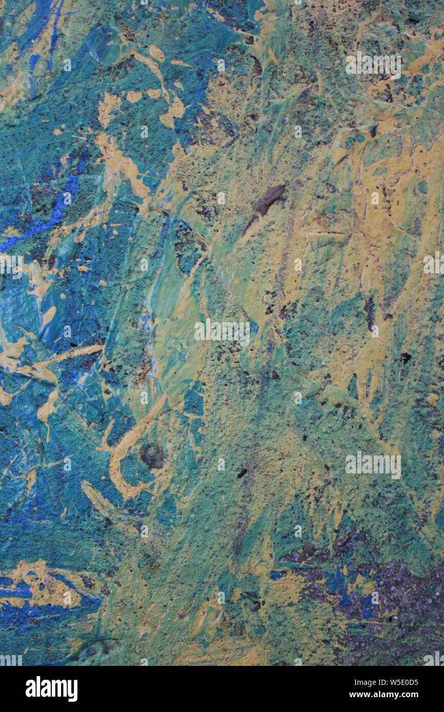 Blue and yellow paint splashed on a sidewalk Stock Photo - Alamy