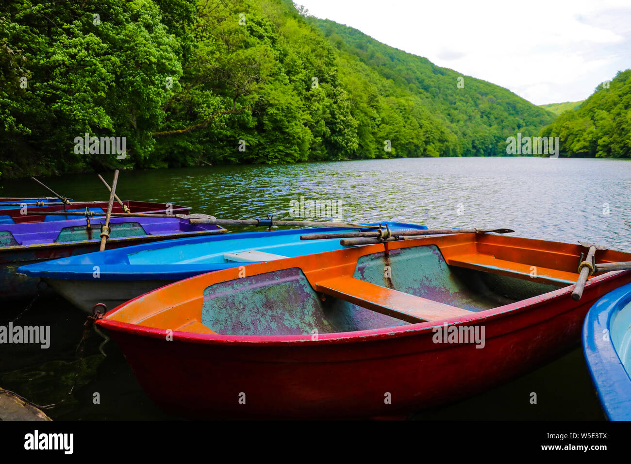 Empty wooden boat on water hi-res stock photography and images - Alamy