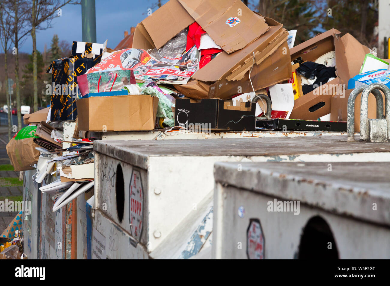 overfull paper container Stock Photo - Alamy