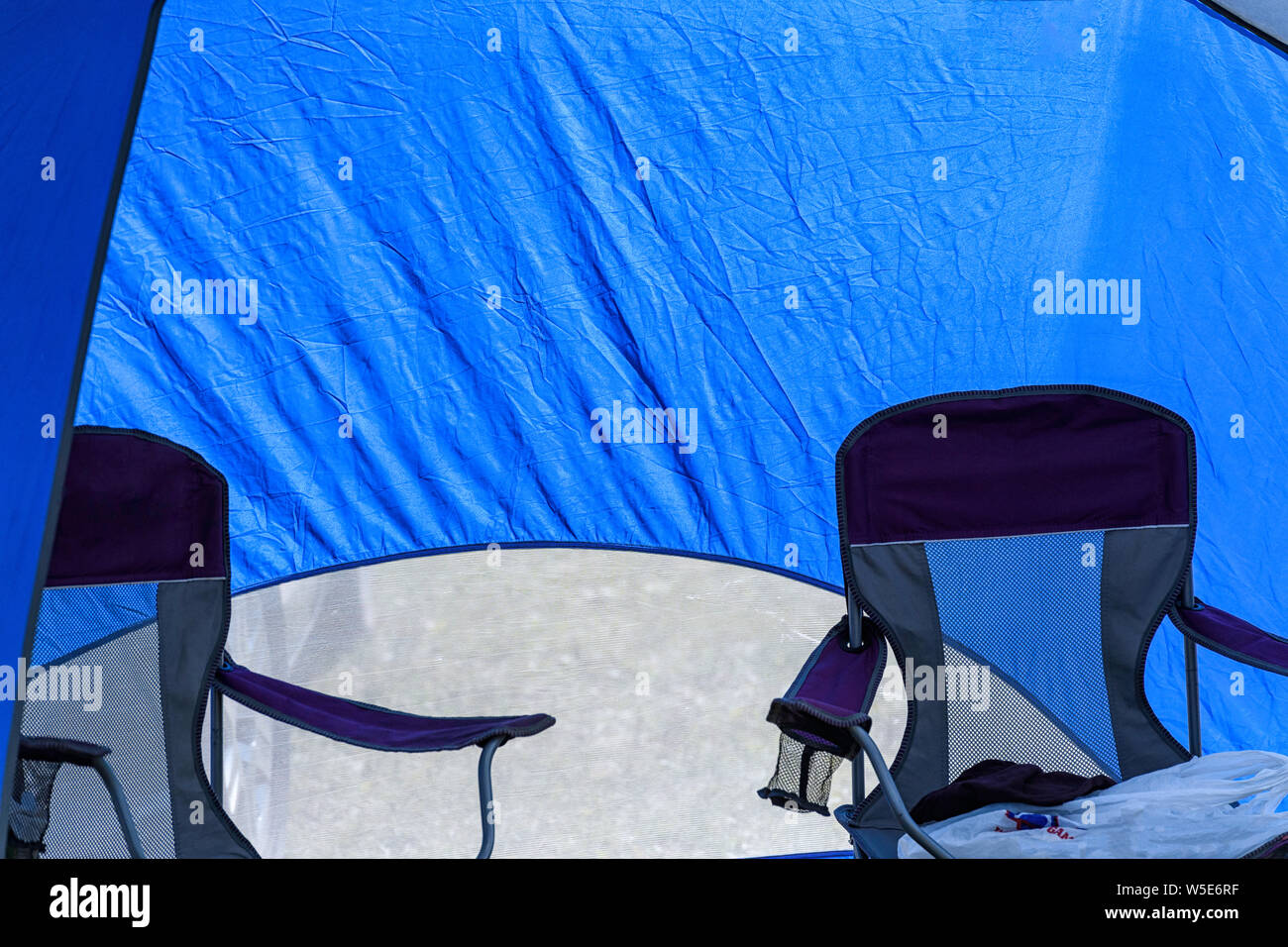 Outdoor camping tent with two fold able portable chairs Stock Photo - Alamy Outdoor camping tent with two fold able portable chairs Stock Photo - Alamy