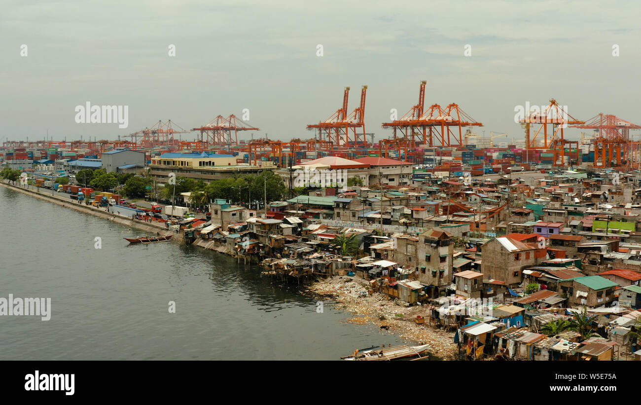 Aerial view of container terminal in the city of Manila. Largest cargo ...