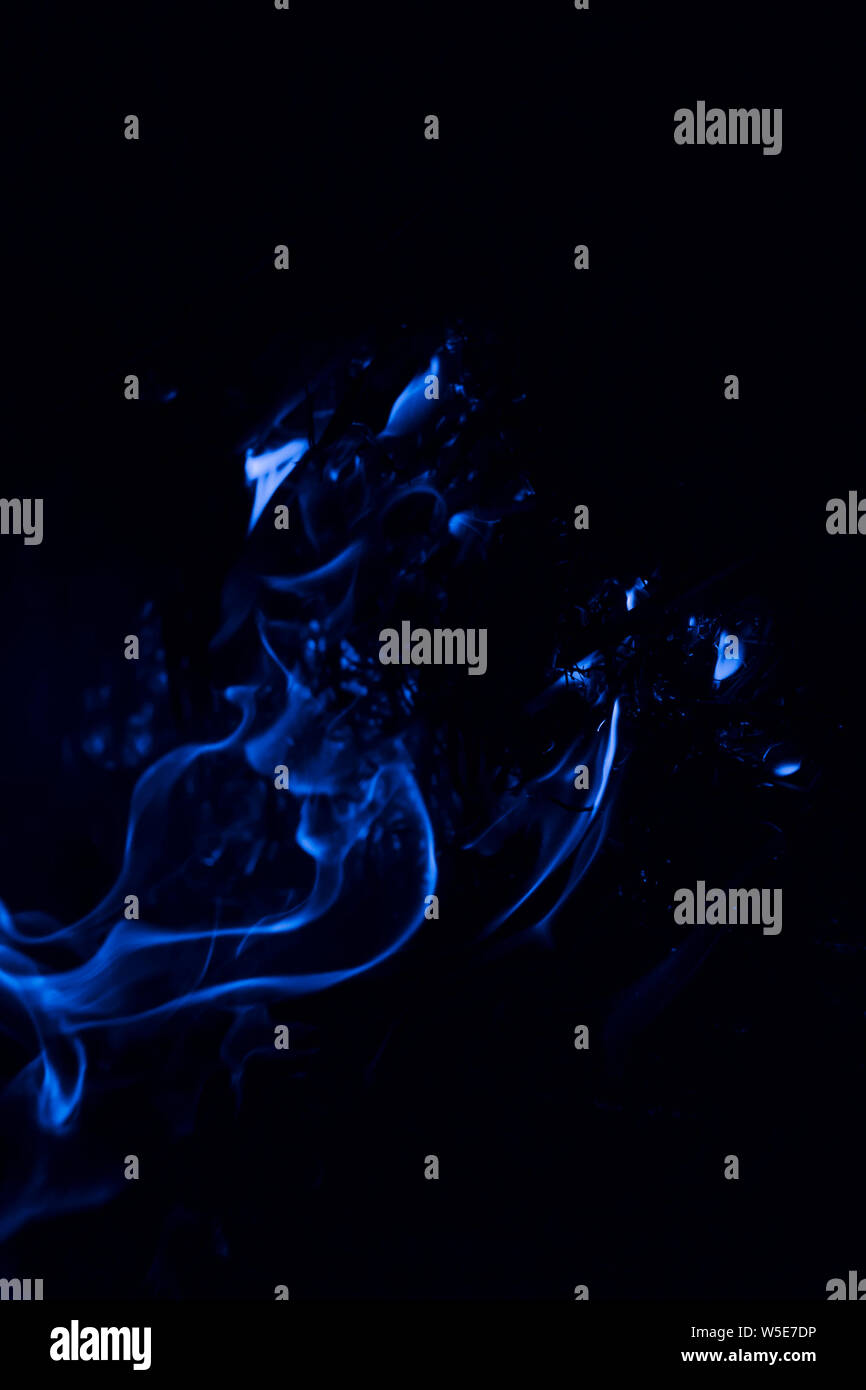Blue flame. Fire. Burning of rice straw at night Stock Photo - Alamy