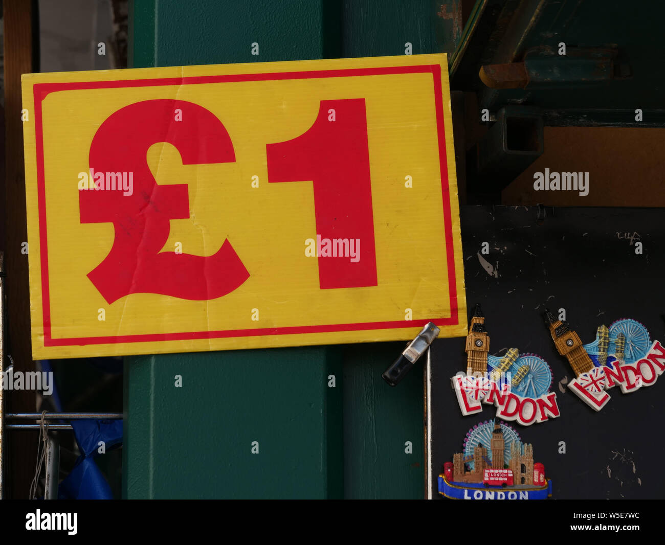 Large one pound sign in red with a yellow background for memorabilia in ...
