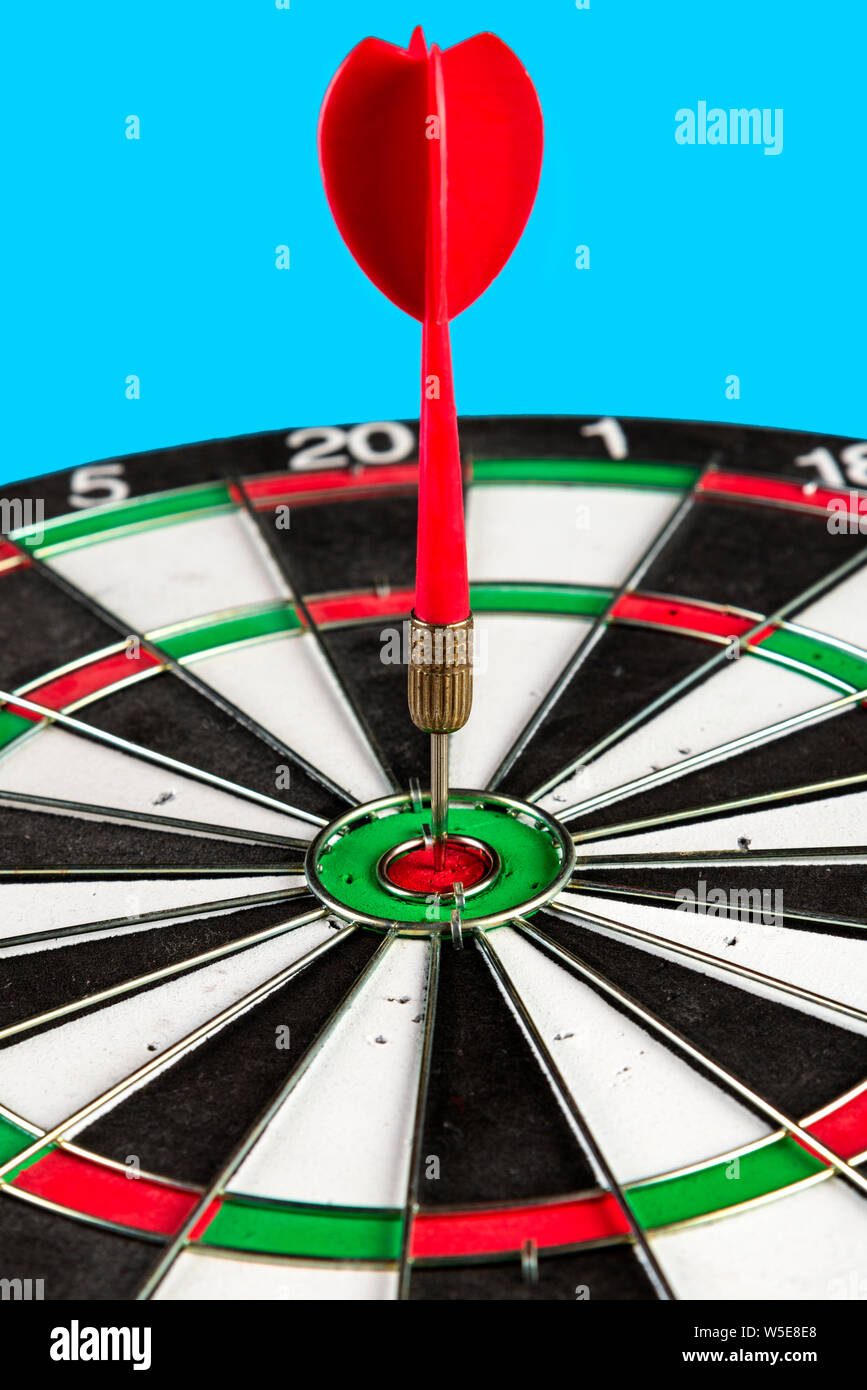Aim with arrow in the center. Target on a blue background with a red ...