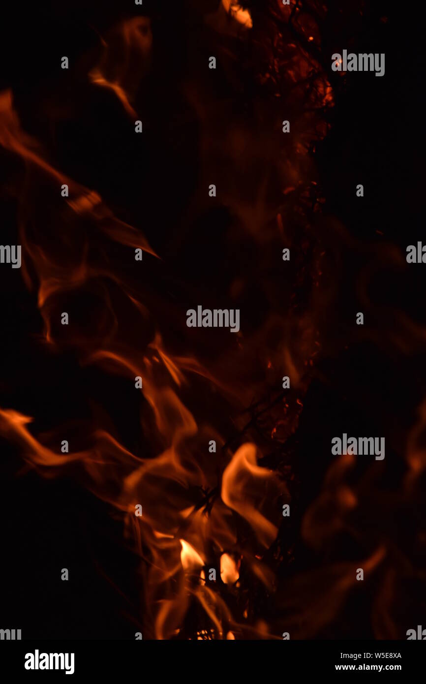 Fire fire. Burning of rice straw at night Stock Photo - Alamy