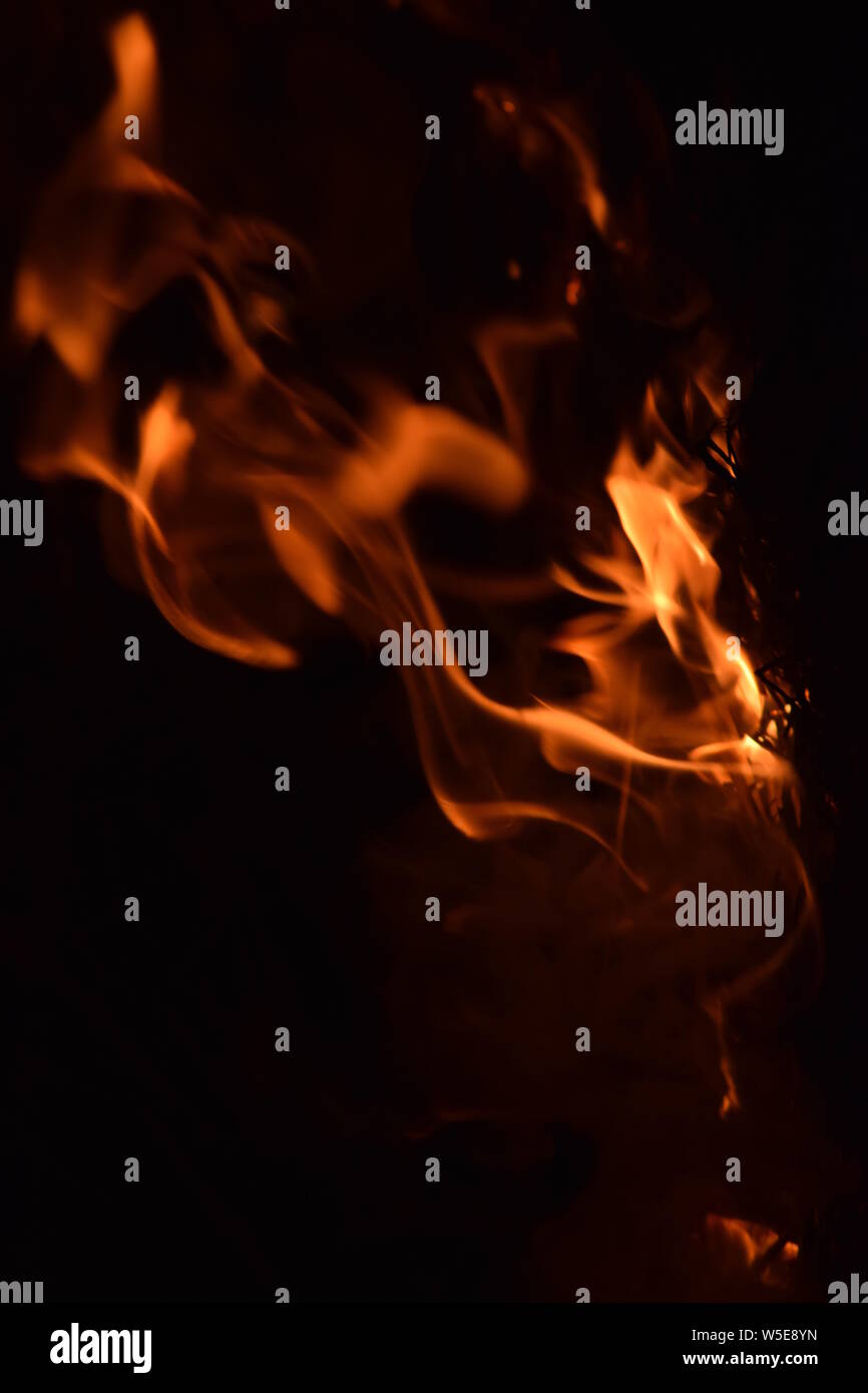 Fire fire. Burning of rice straw at night Stock Photo - Alamy