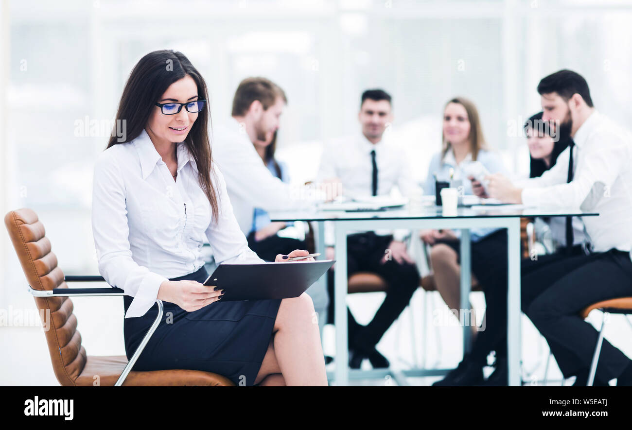 Woman leading team paper hi-res stock photography and images - Alamy