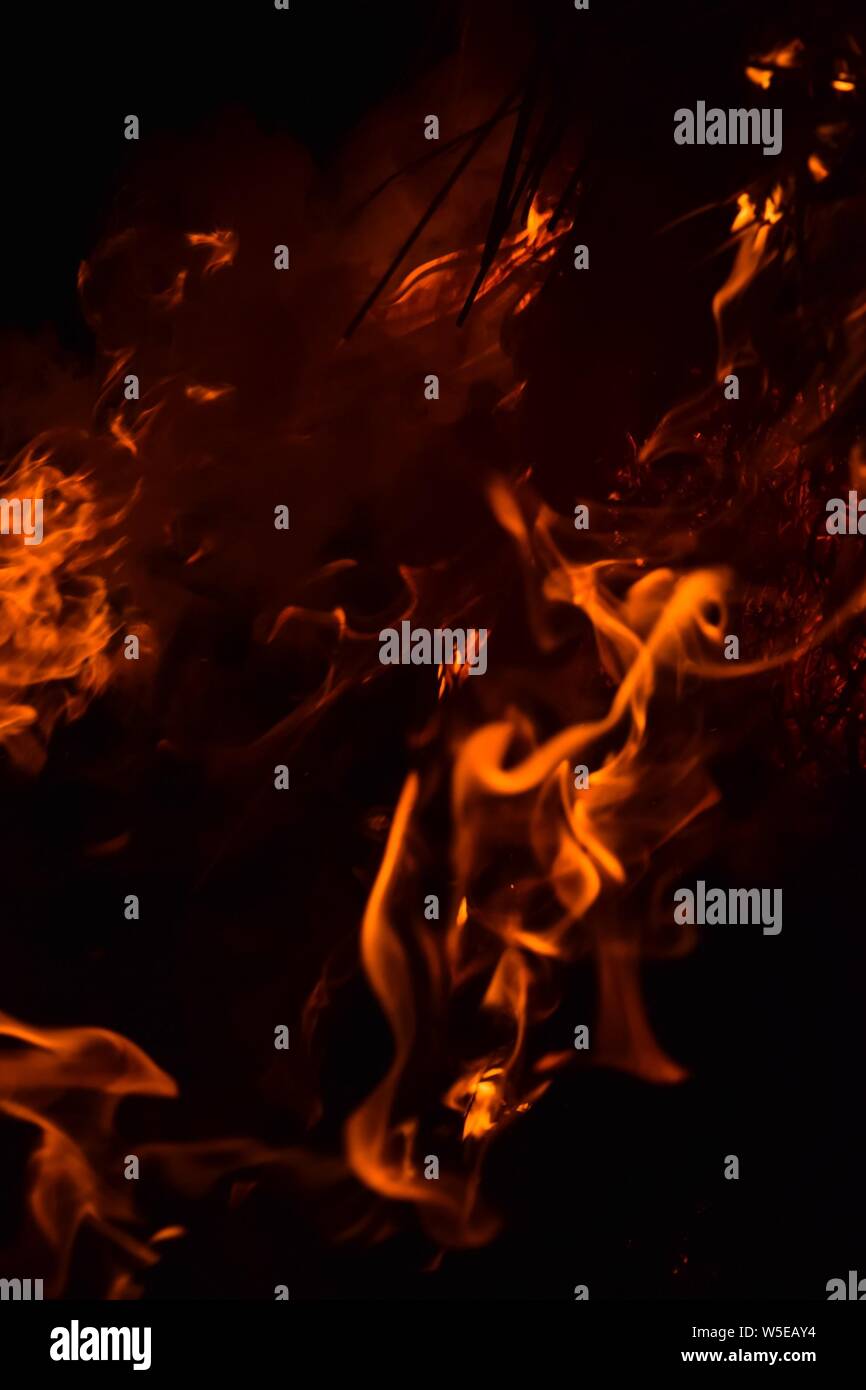 Fire. Burning of rice straw at night Stock Photo - Alamy