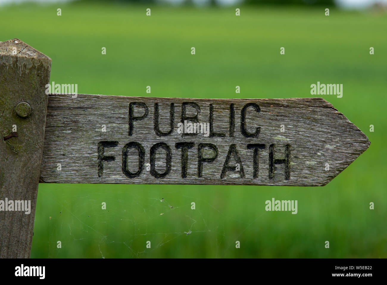 Old wooden public footpath sign Stock Photo - Alamy