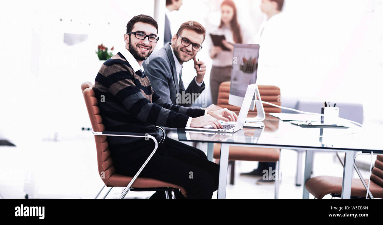 business team working on a presentation of a new advertising project ...