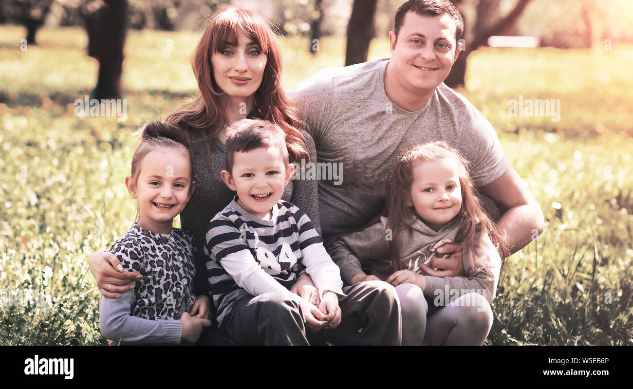 Friendly, cheerful family of five Stock Photo - Alamy