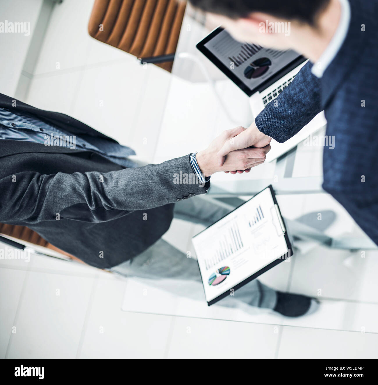 Top view colleagues handshake close hi-res stock photography and images ...