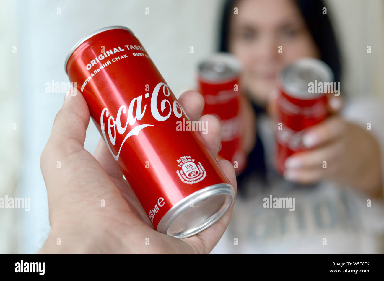 Coke cans girl hi-res stock photography and images - Alamy