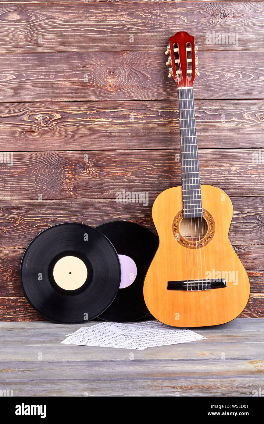 Vinyl records, guitar and musical notes Stock Photo - Alamy