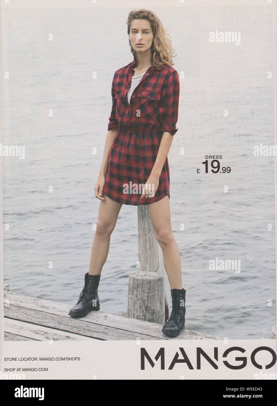 poster advertising MANGO fashion house with Daria Werbowy in paper ...