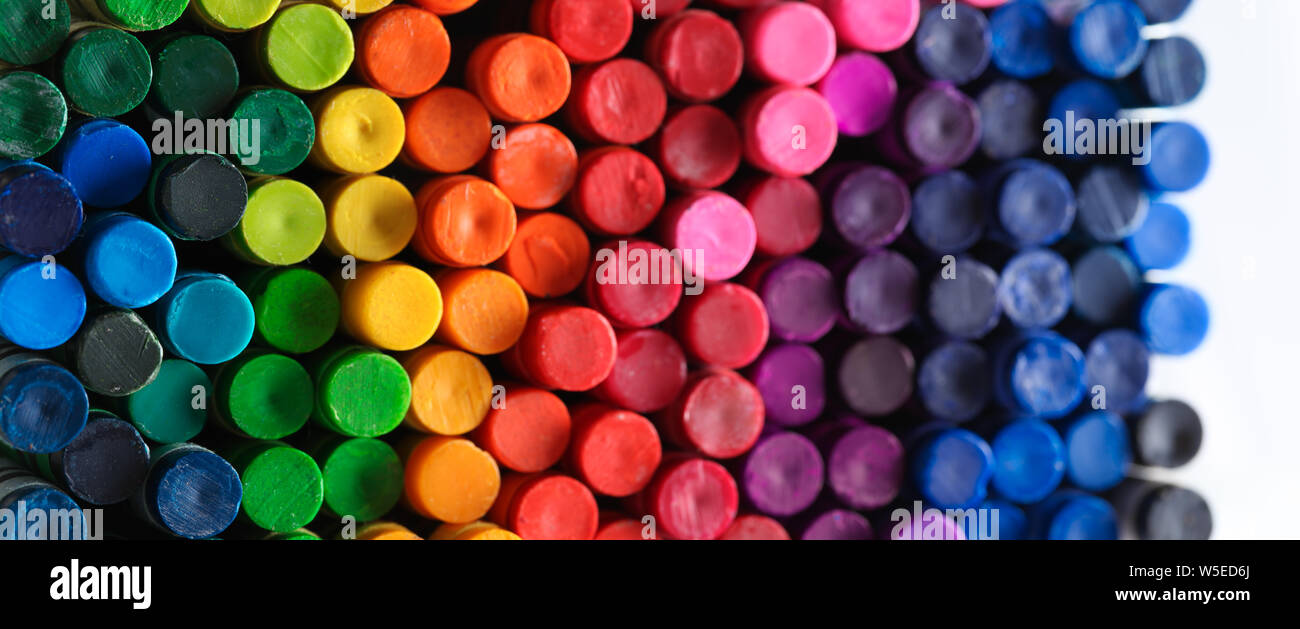 Box of crayons in a rainbow of colors background Stock Photo - Alamy