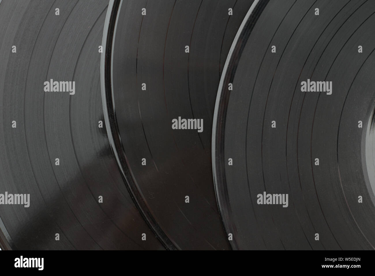 Black vinyl records background Stock Photo - Alamy