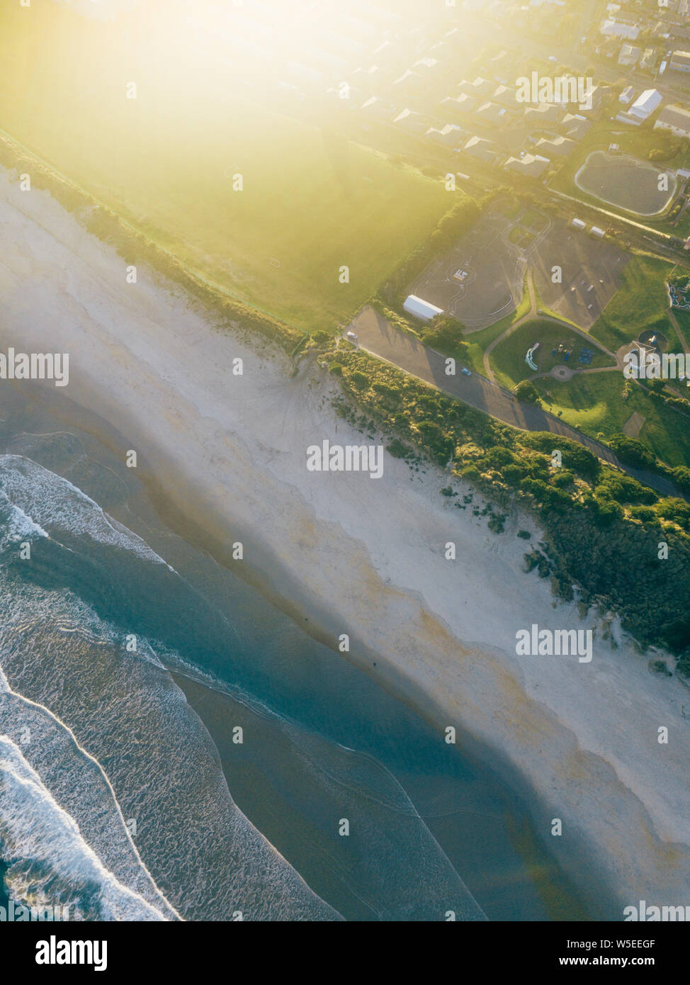 Drone shot at the beach during sunset Stock Photo - Alamy
