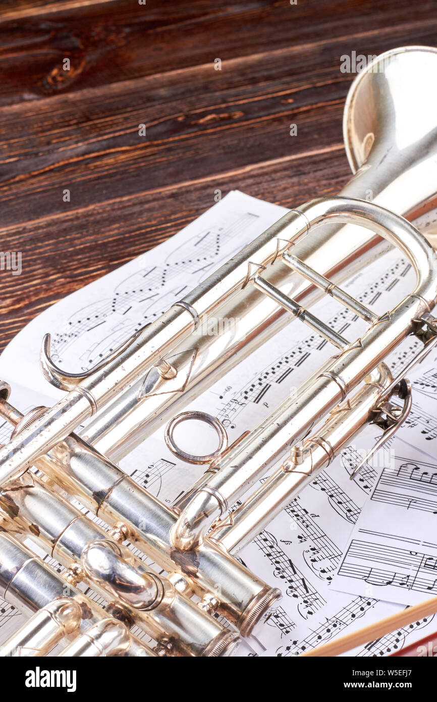 Trumpet and musical notes, vertical image Stock Photo - Alamy