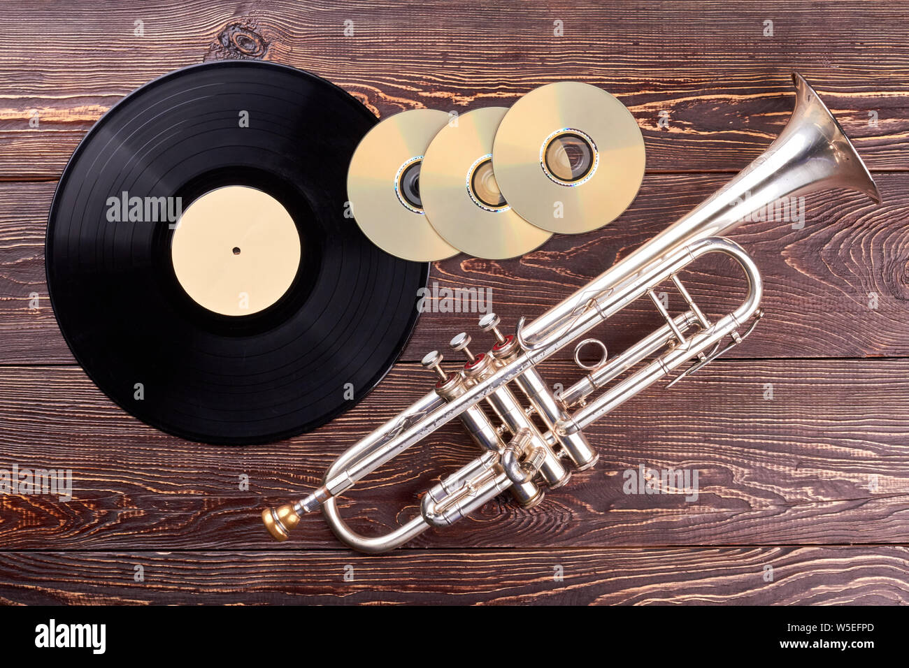 Vinyl record, cd discs and trumpet Stock Photo - Alamy