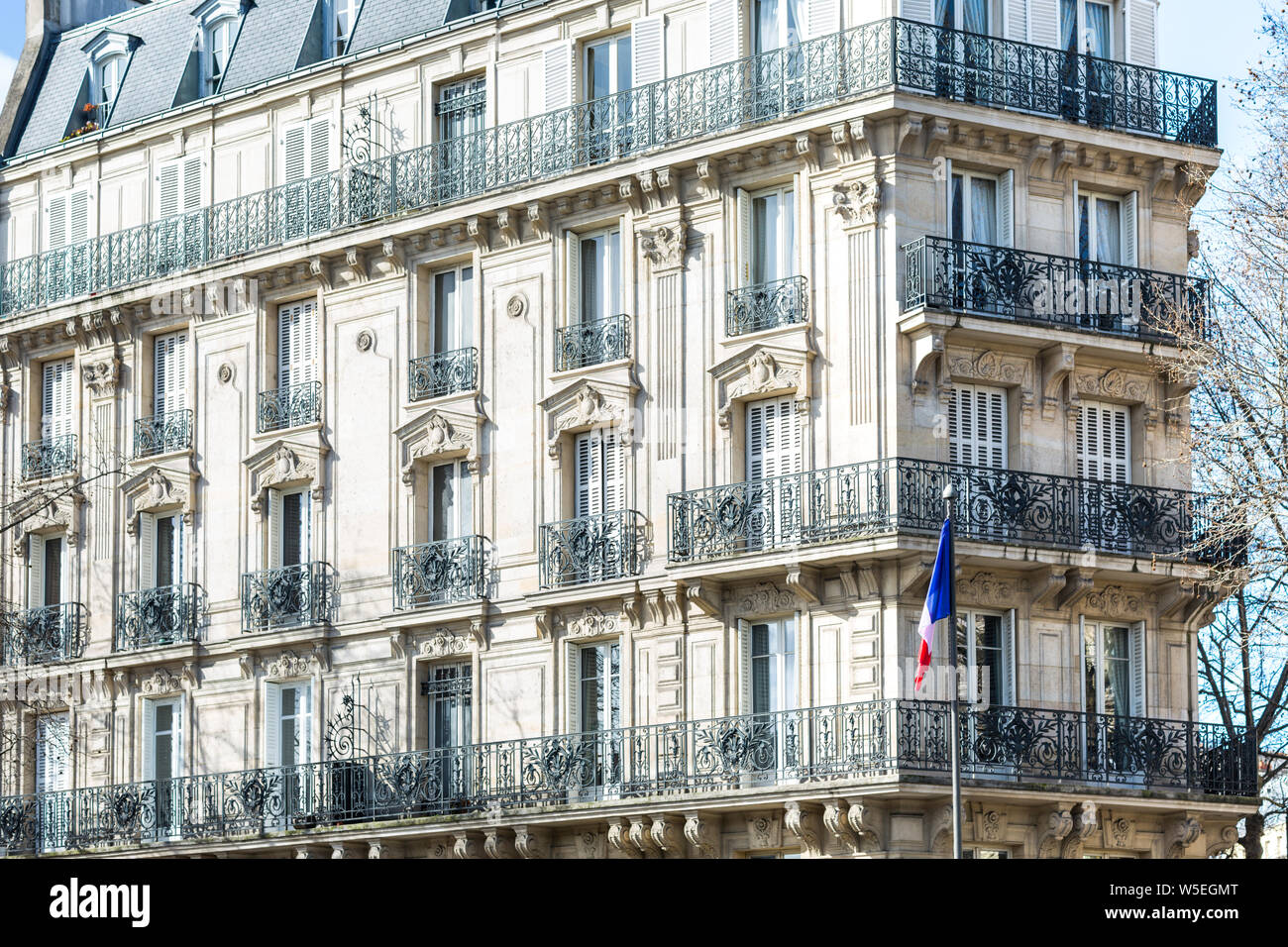 Elegant Haussmann apartment buildings with balconies and iron railings ...