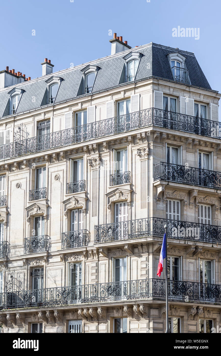 Elegant Haussmann apartment buildings with balconies and iron railings ...