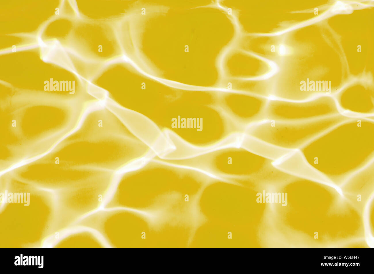 Scientific abstract background with luminous gold and yellow liquid ...