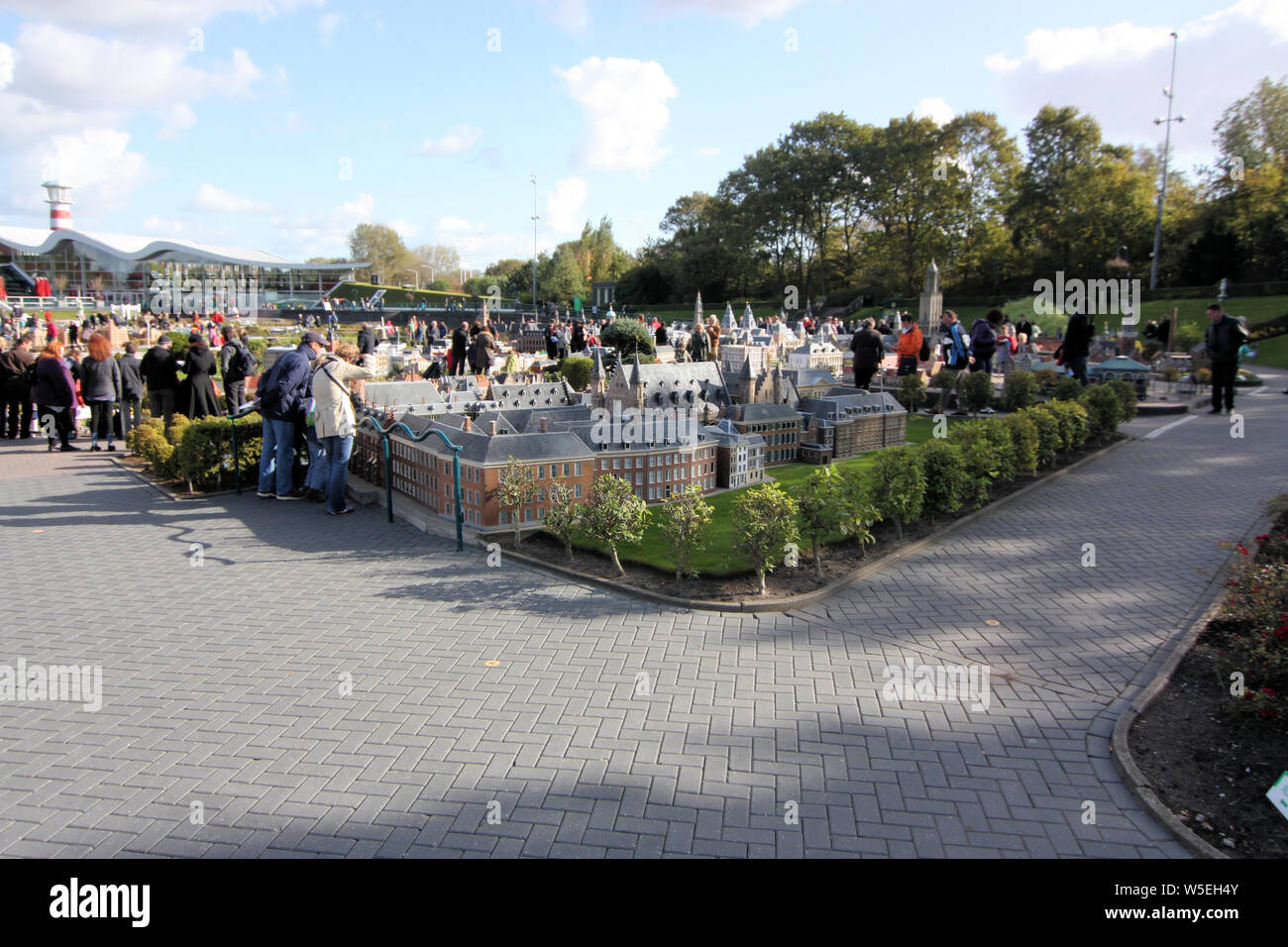 People look at the miniature buildings in Madurodam amusement park in ...