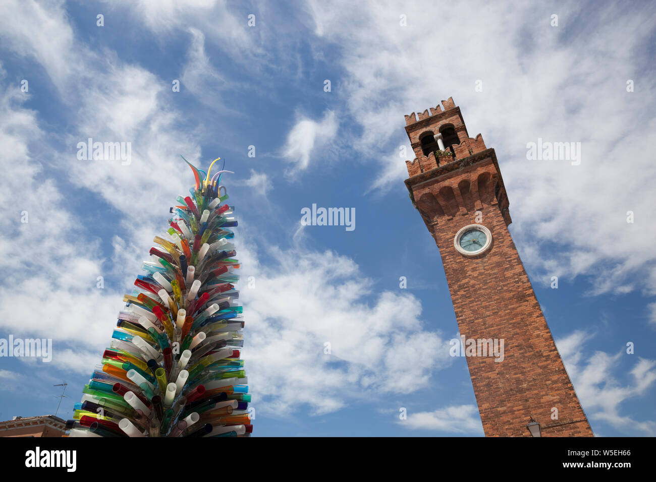 Glass Tree sculpture and tall clock tower in Murano ,Venice,Italy Stock ...