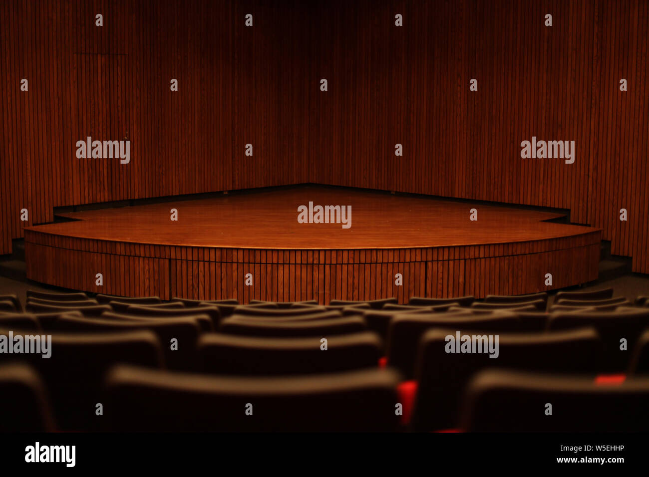 Stage & empty chairs Stock Photo - Alamy