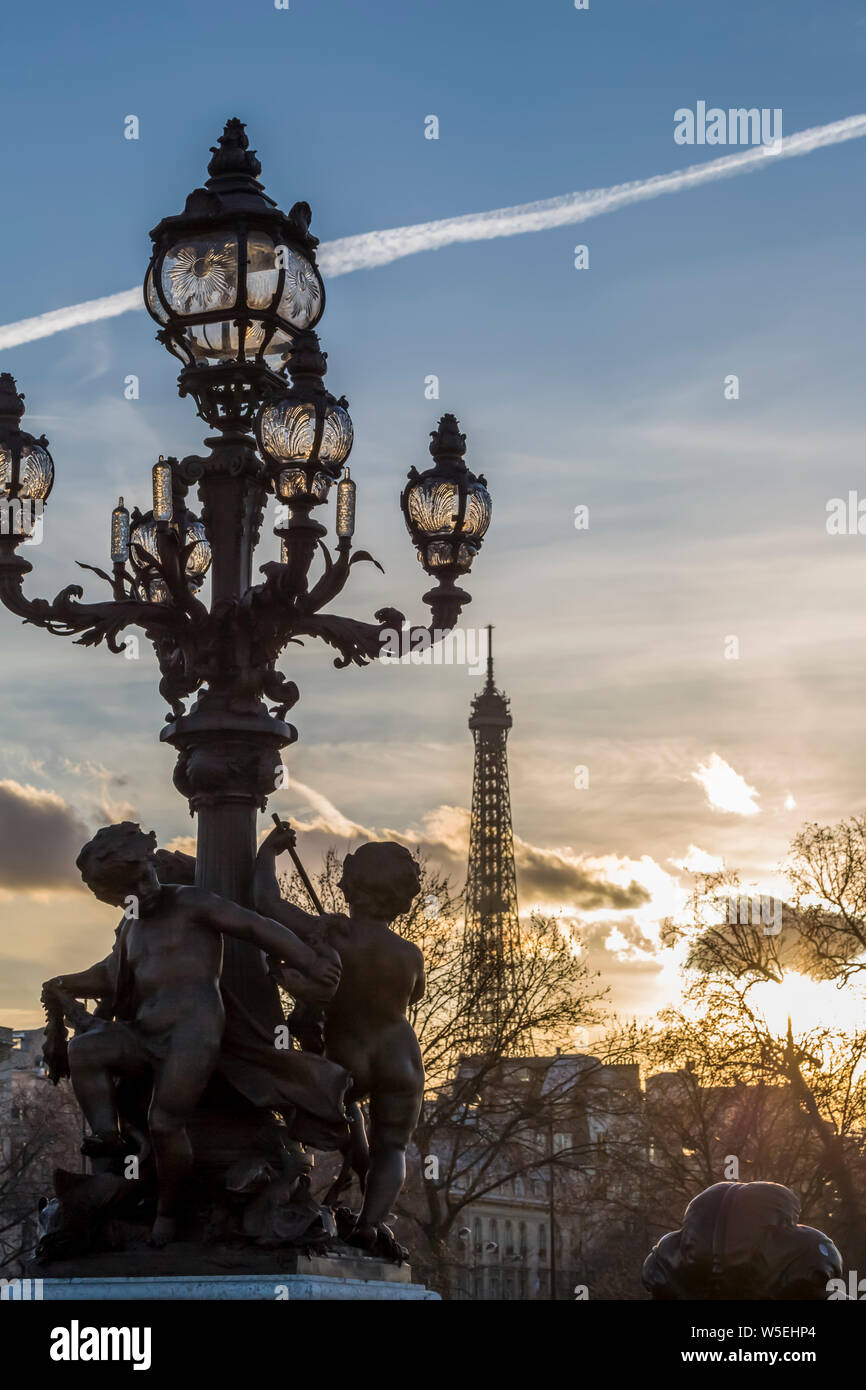Eiffel Tower with dramatic sunset at Pont Alexandre III Stock Photo - Alamy