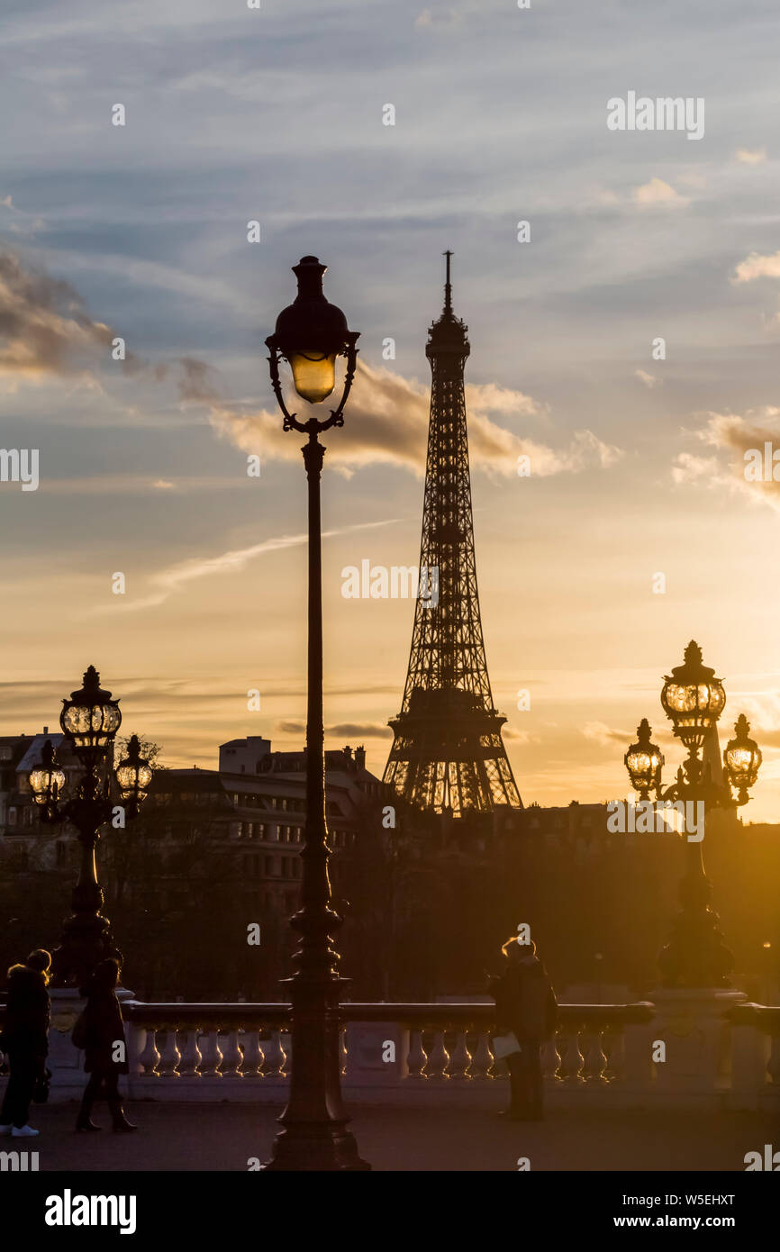 Eiffel Tower with dramatic sunset at Pont Alexandre III Stock Photo - Alamy
