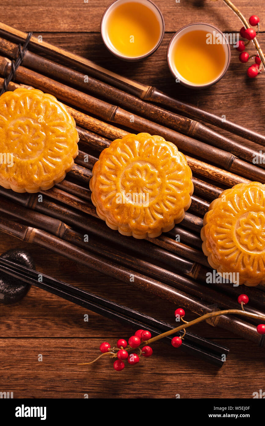 Moon cake Mooncake table setting - Chinese traditional pastry with tea ...