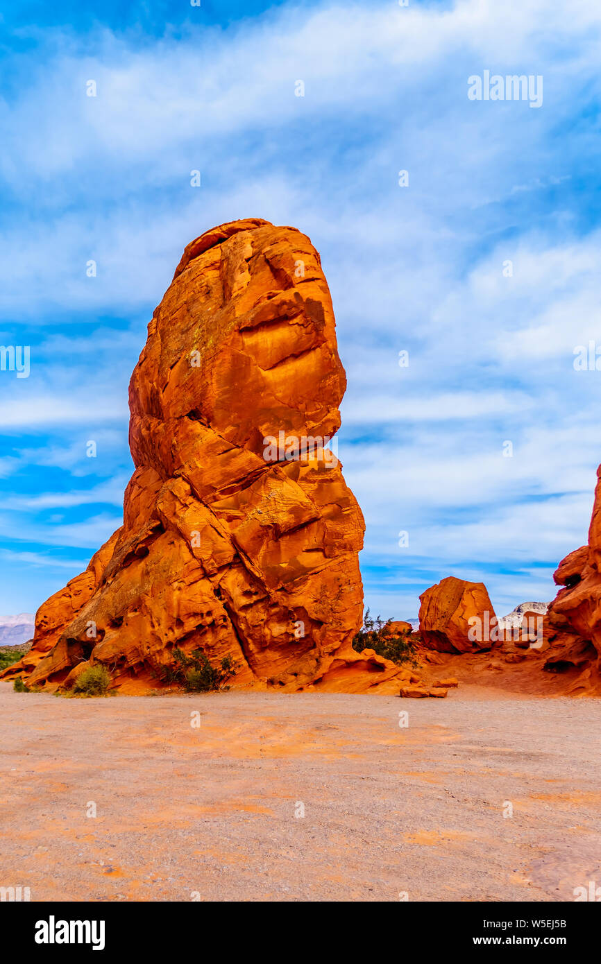 Sunrise over the bright red Aztec sandstone rock formation of the Seven ...