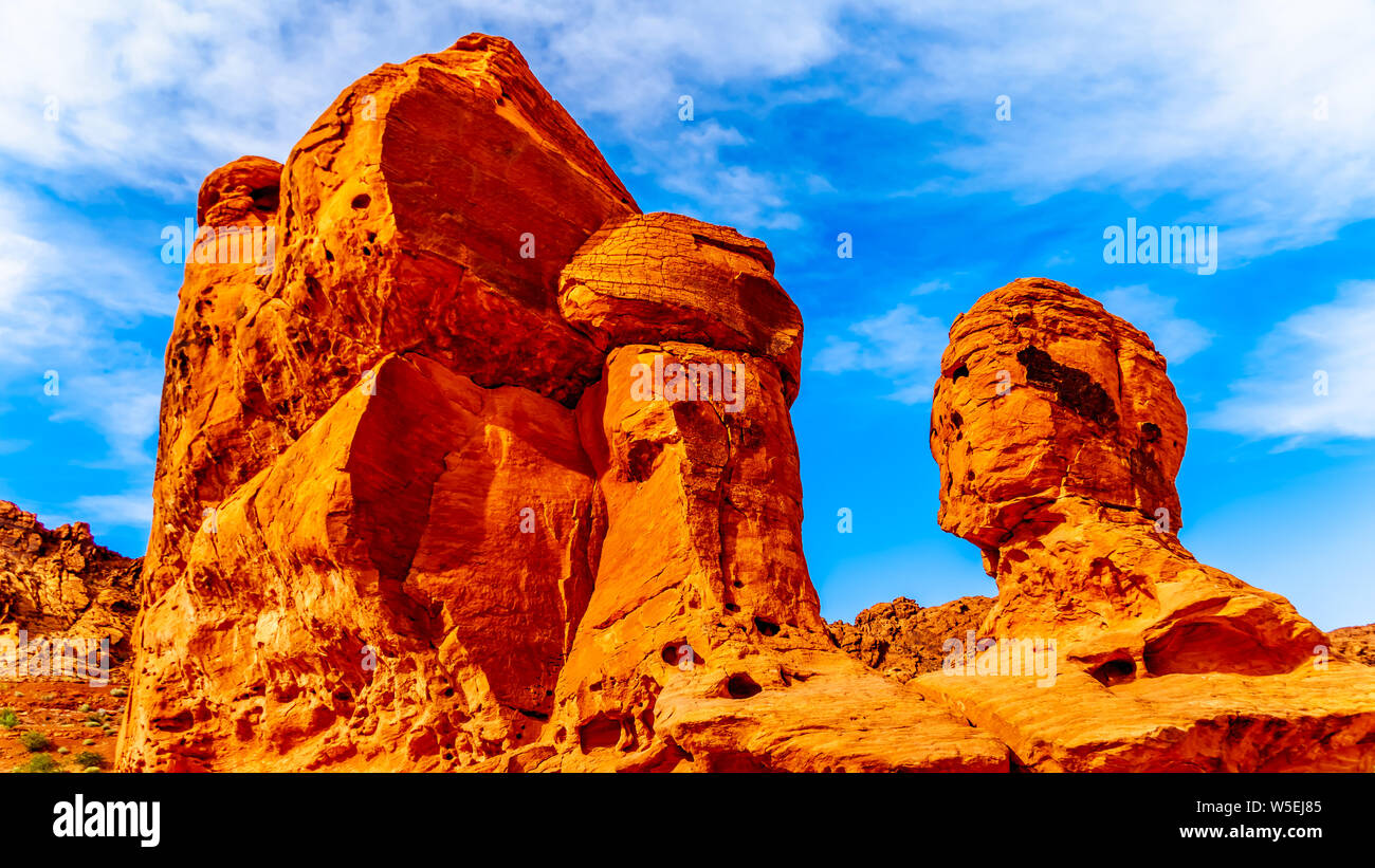 Sunrise over the bright red Aztec sandstone rock formation of the Seven ...