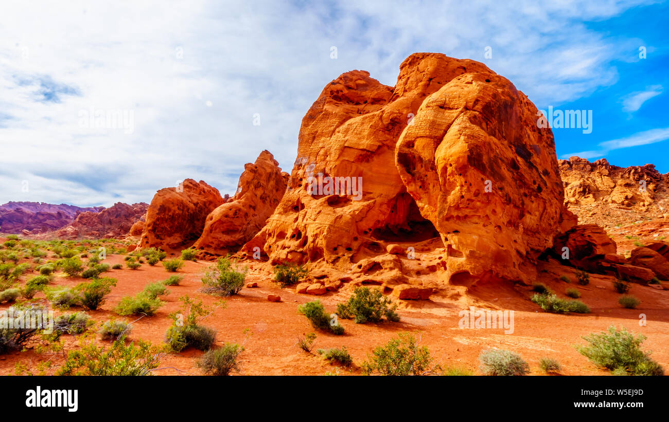 Sunrise over the bright red Aztec sandstone rock formation of the Seven ...