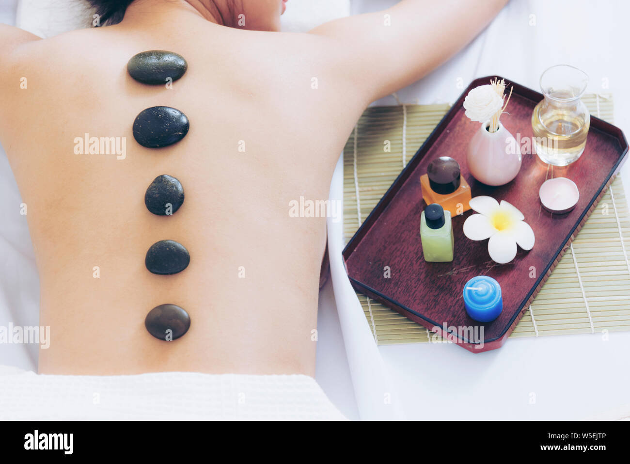 Spa concept.Stone Massage on back relaxation for beautiful woman Stock ...