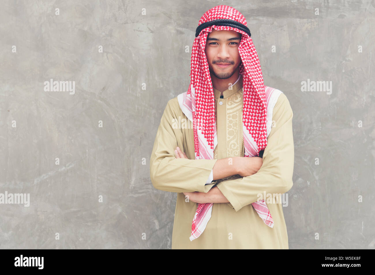Smiling handsome arab man Stock Photo - Alamy